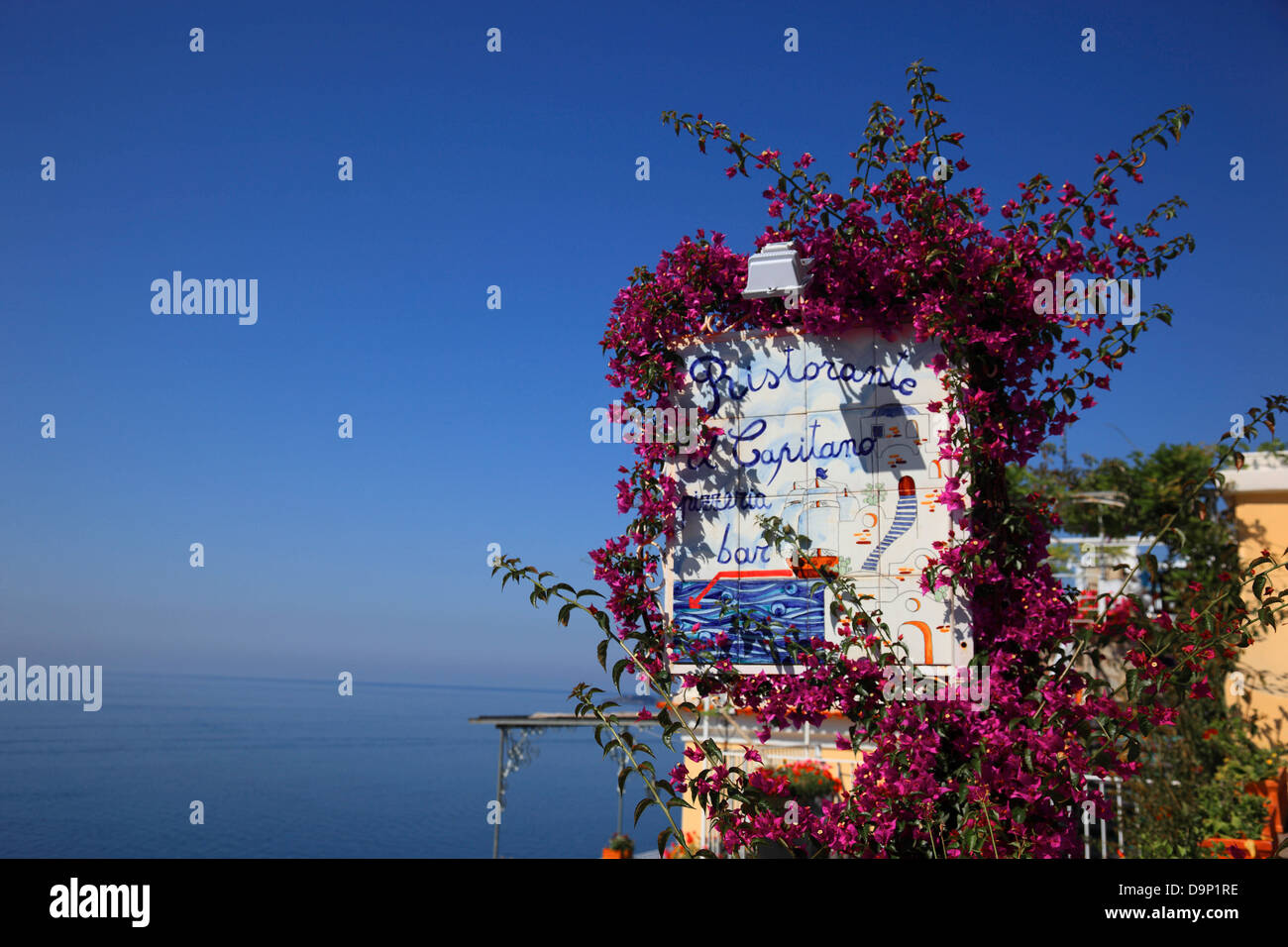 Positano, flowers and restaurant sign, Campania, Italy Stock Photo - Alamy