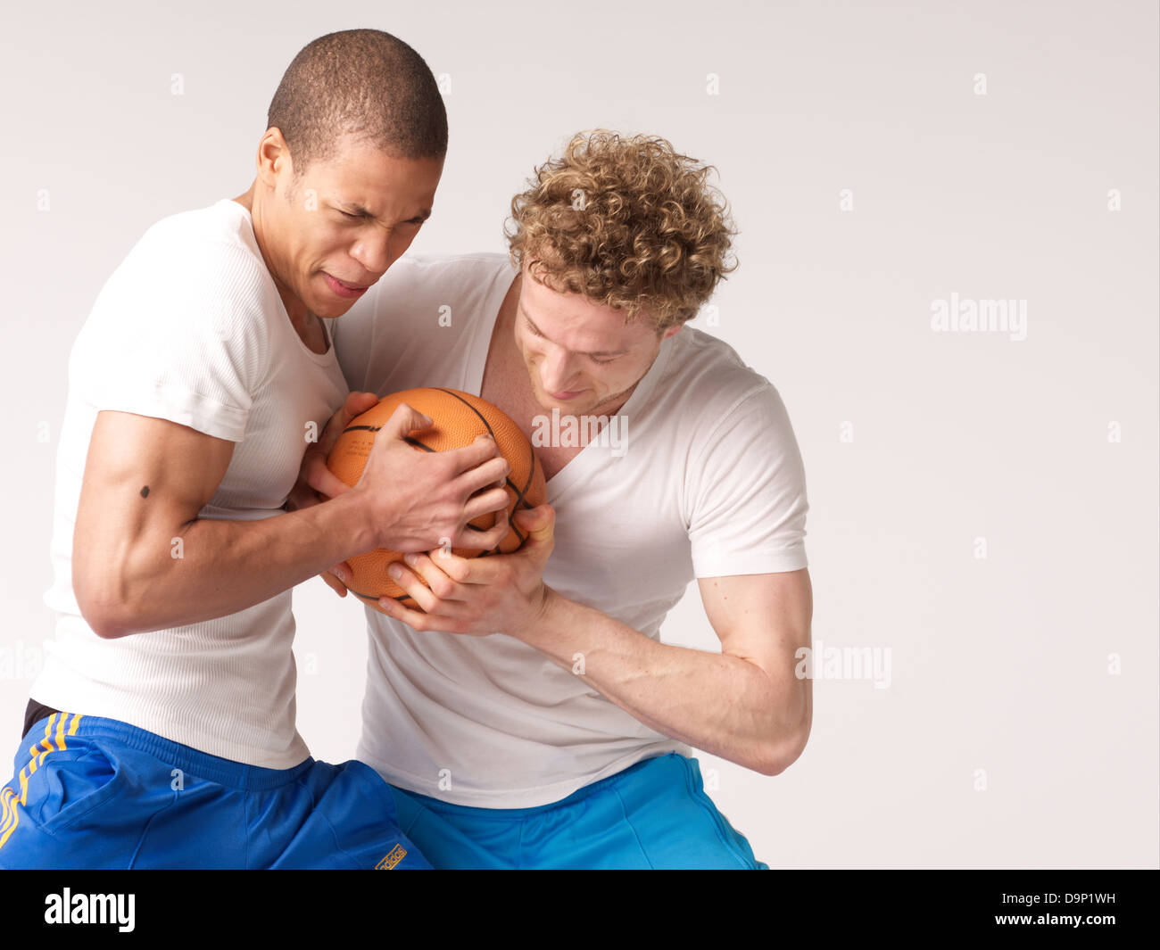 Two friends playing basketball Stock Photo - Alamy