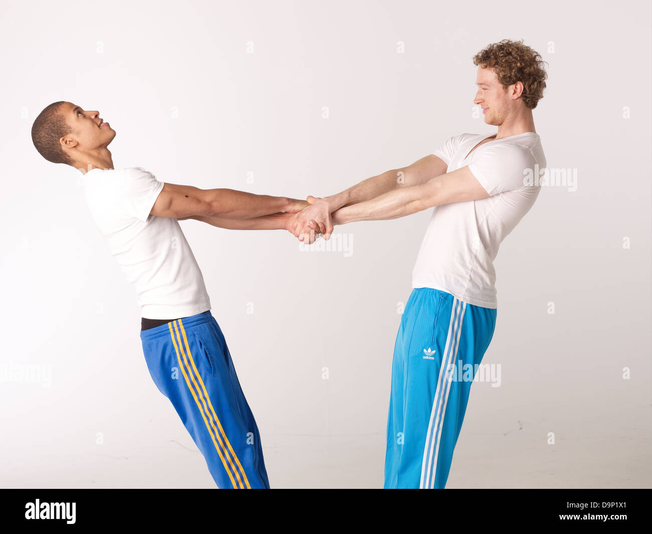 Two Male Friends Holding Hands