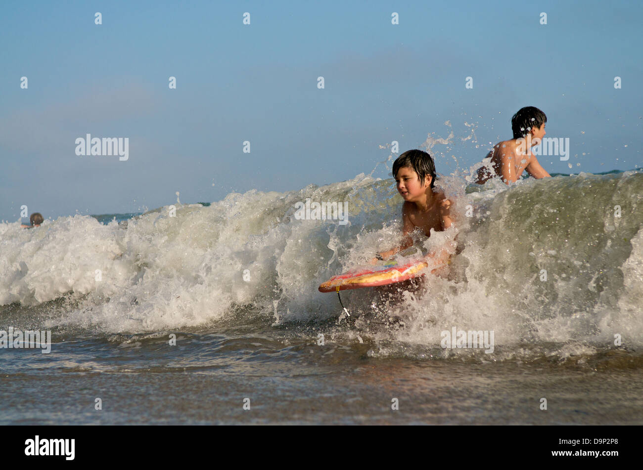 Boy boogie board hi-res stock photography and images - Alamy