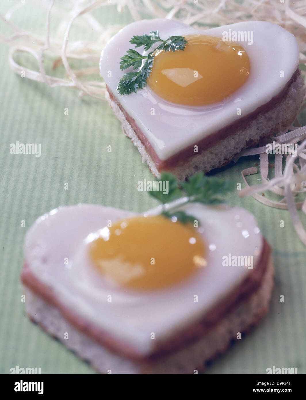 Bread with heart-shaped fried egg Stock Photo - Alamy