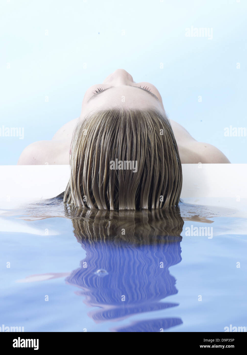 Woman with hair in water Stock Photo - Alamy