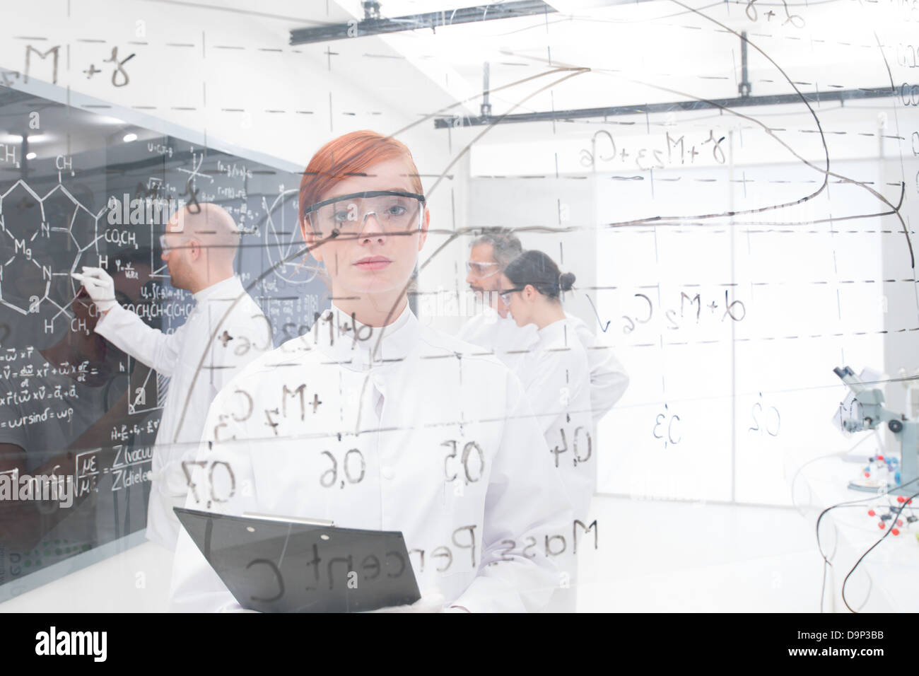 close-up seen trough a transparent board in a chemistry lab of a ...