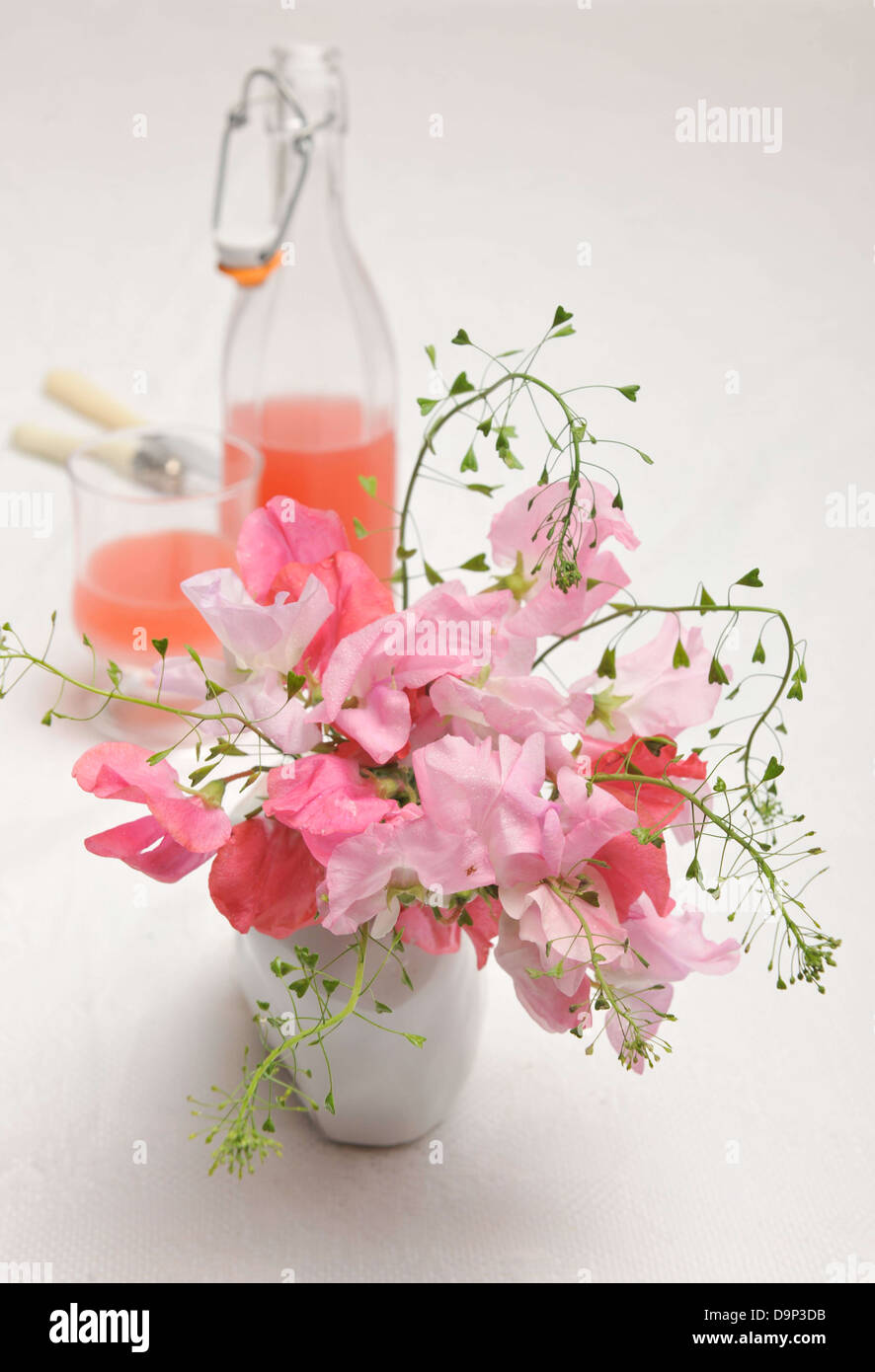 Pink flowers and refreshing drink Stock Photo - Alamy