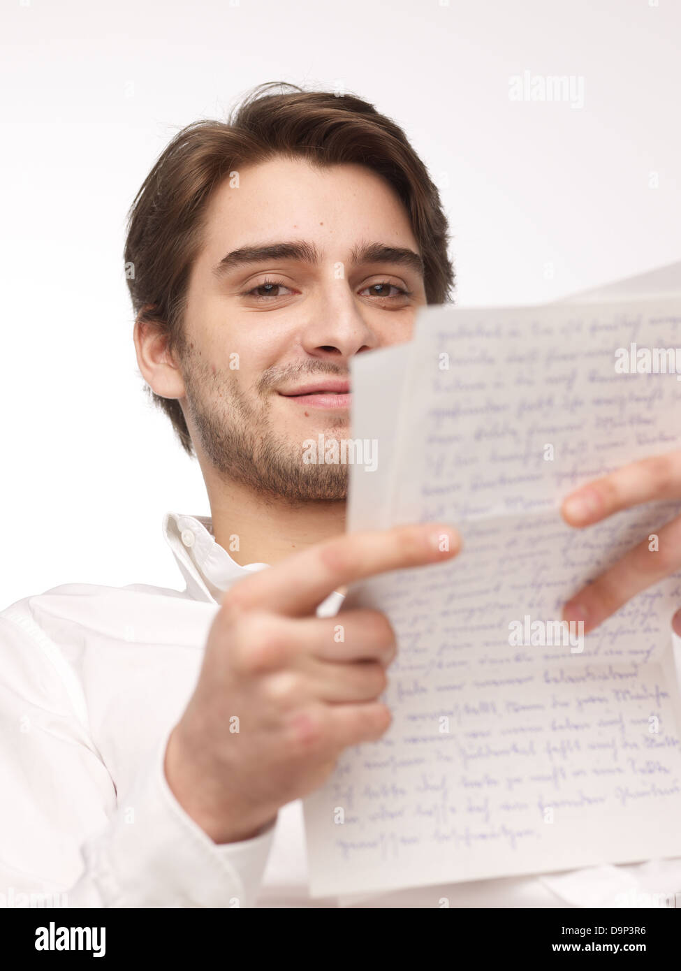 Man reading letter Stock Photo - Alamy