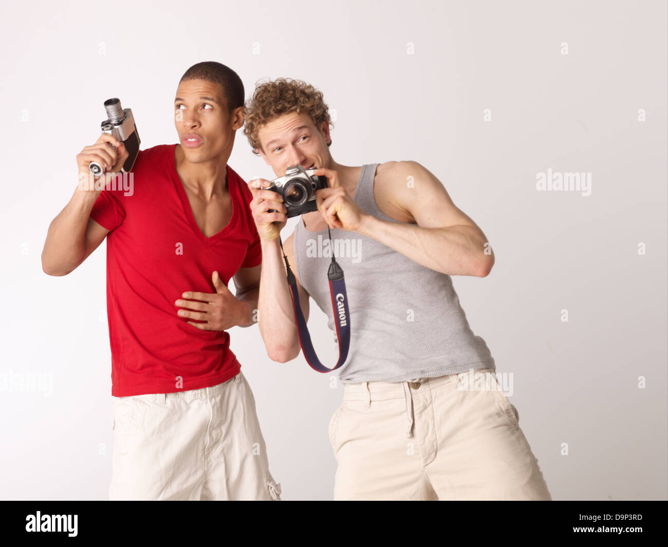 Two male friends photographing hi-res stock photography and images - Alamy
