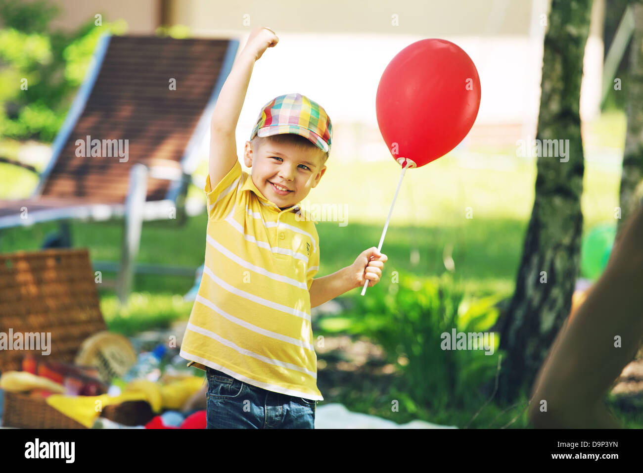 Little smiling boy with red baloon Stock Photo - Alamy