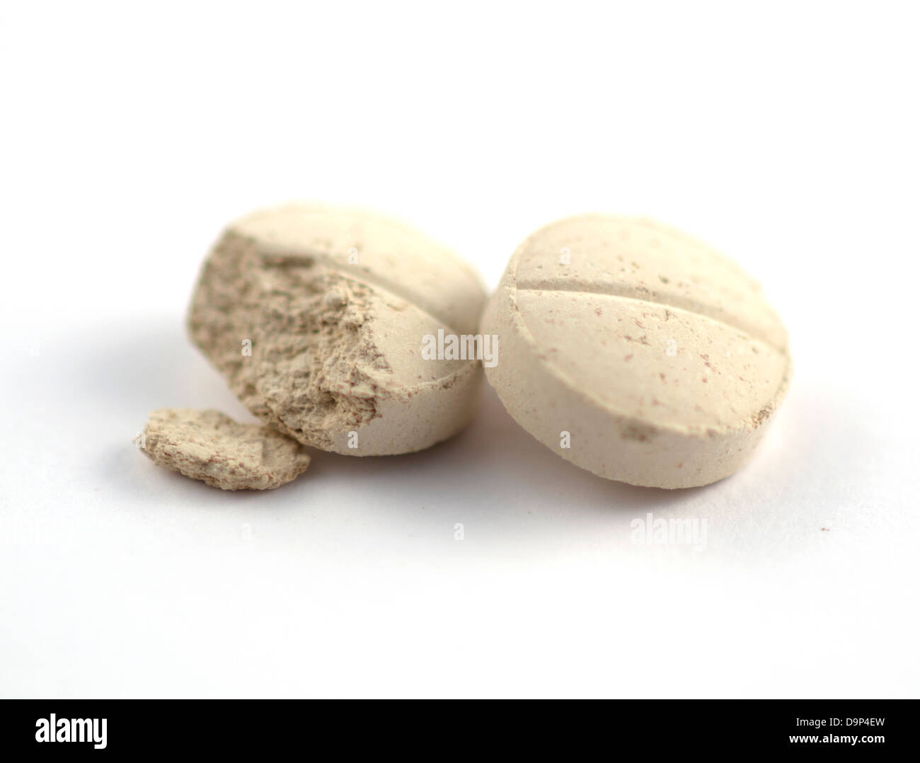 Medical health remedies, two pills one broken, medication Stock Photo ...