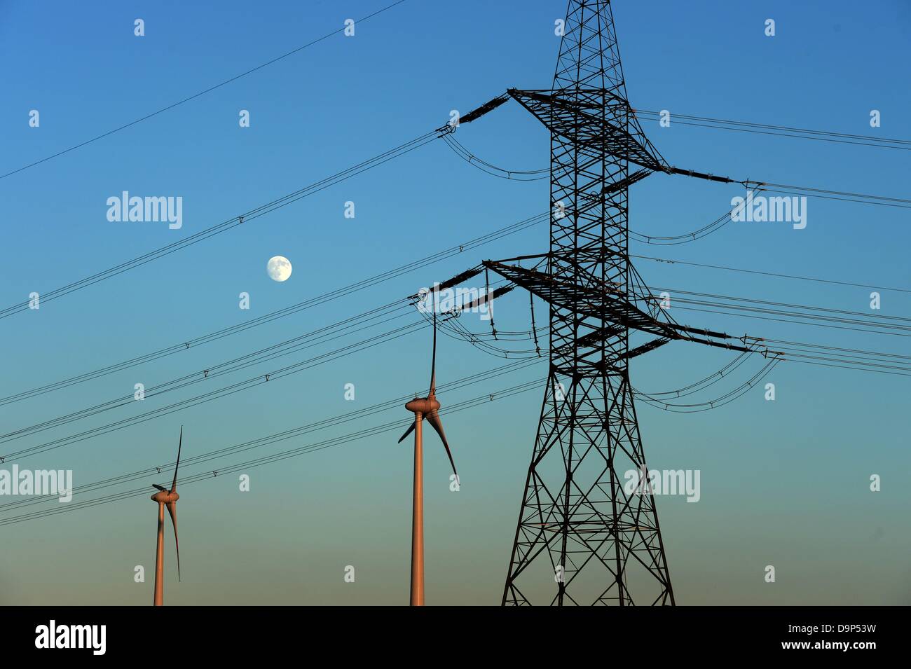 ILLUSTRATION - Wind turbines, pylons, and power lines are pictured in ...