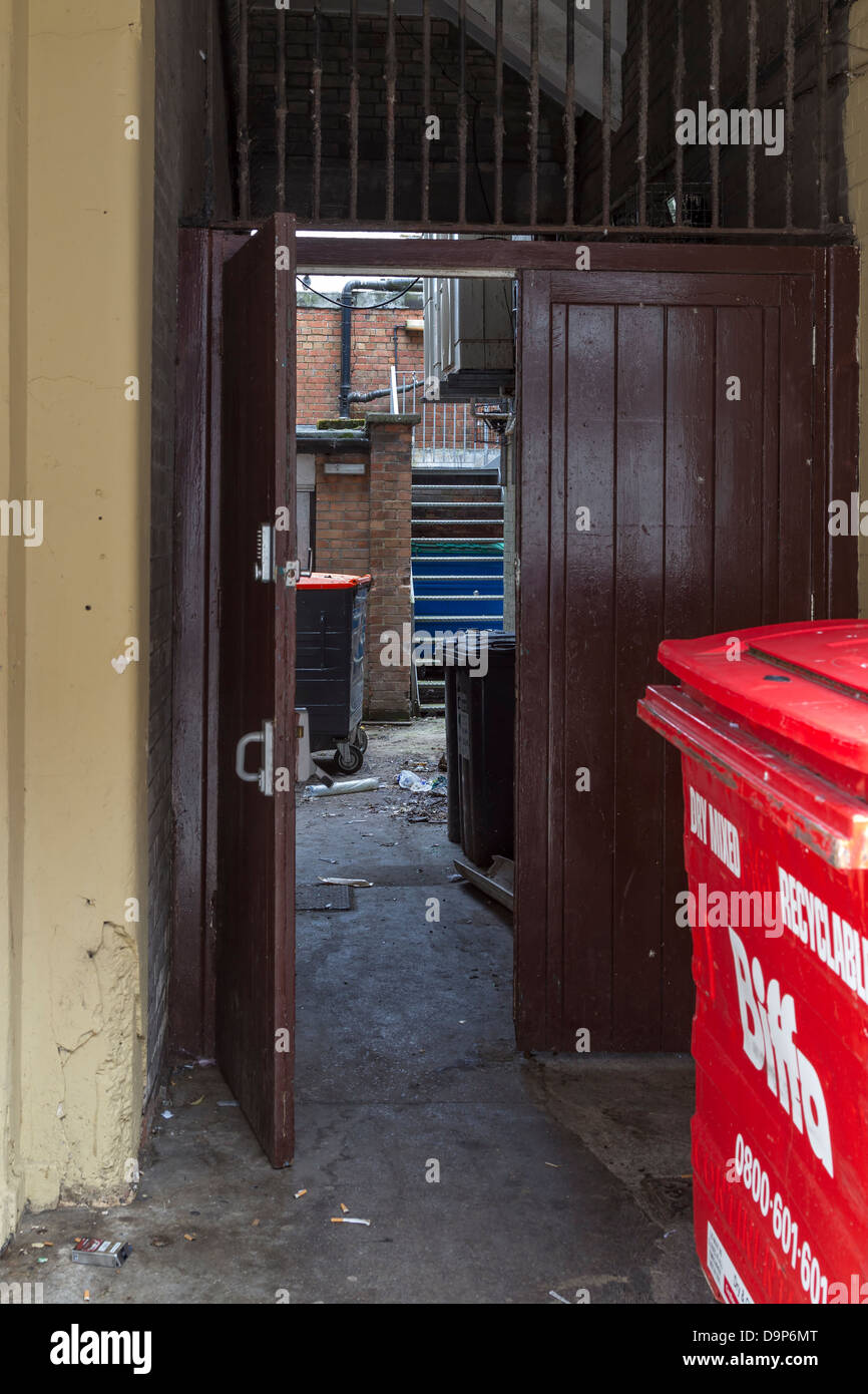Open door to Alleyway Stock Photo - Alamy