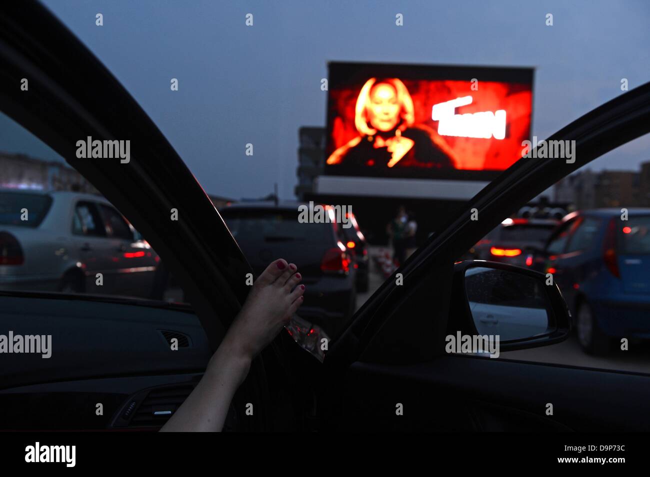 Cars are parked at the drive-in theatre Audi Urban Cinema situated at ...