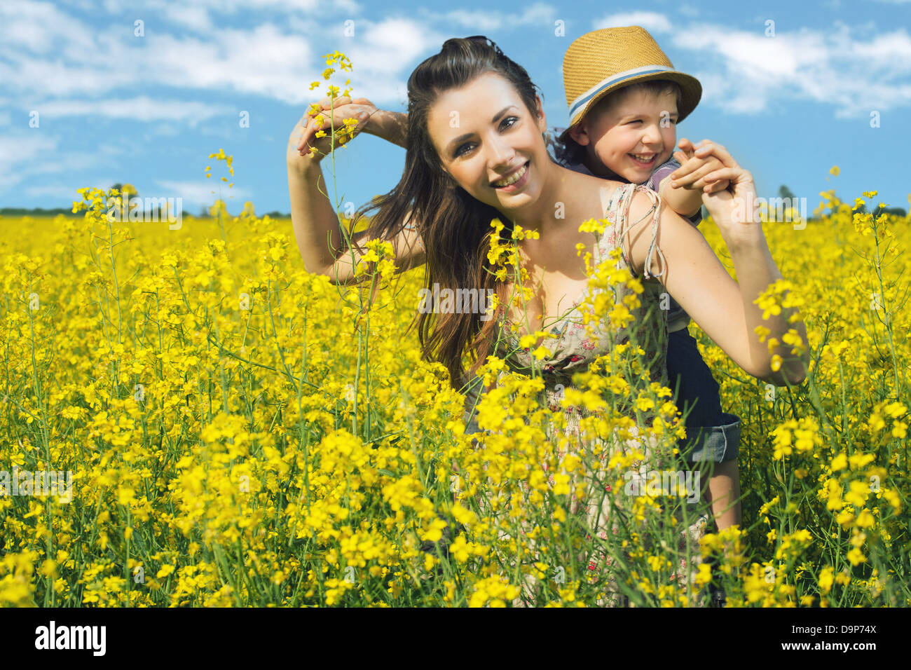 Mother and her cute child in spring park Stock Photo - Alamy