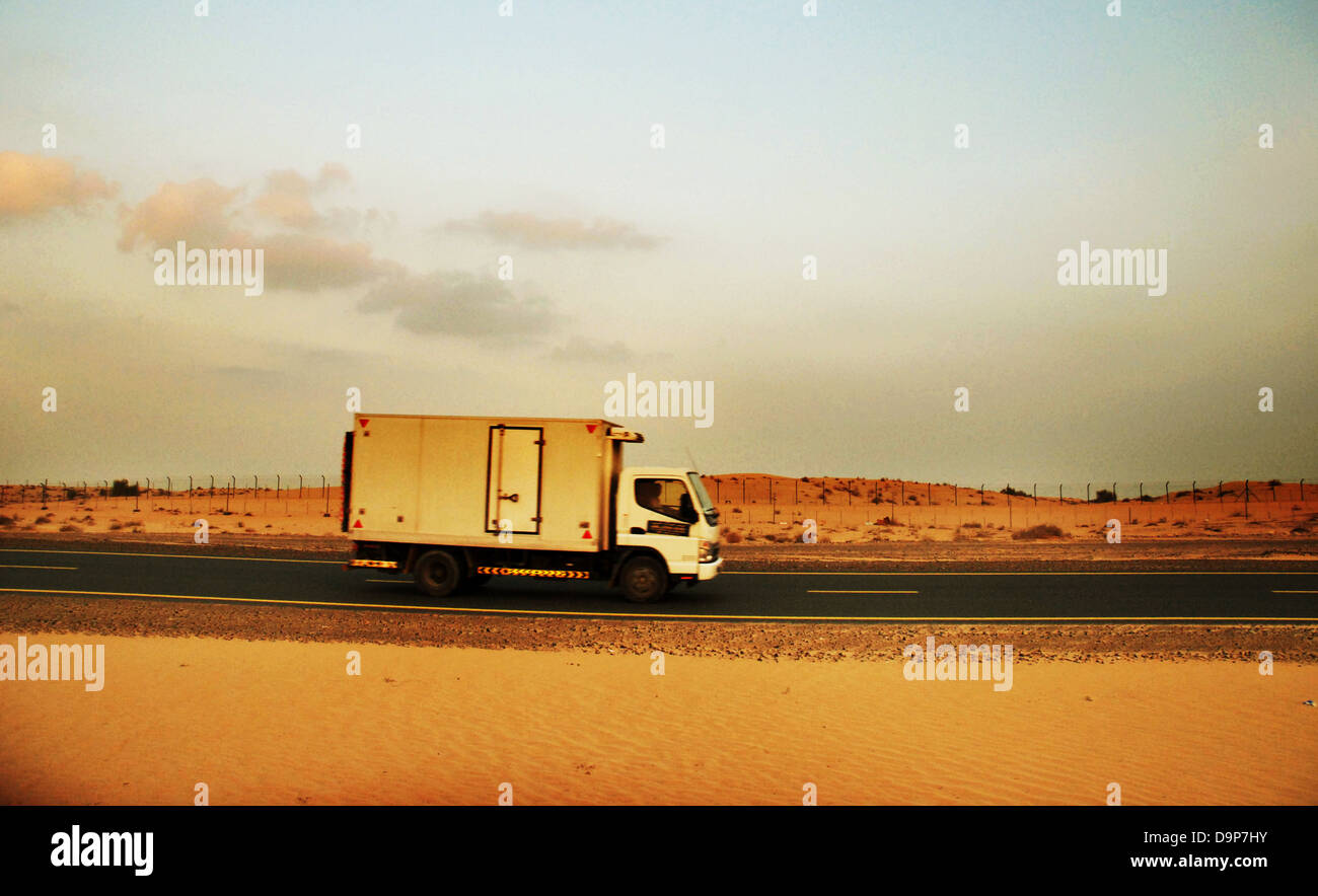 Lorry on desert road hi-res stock photography and images - Alamy