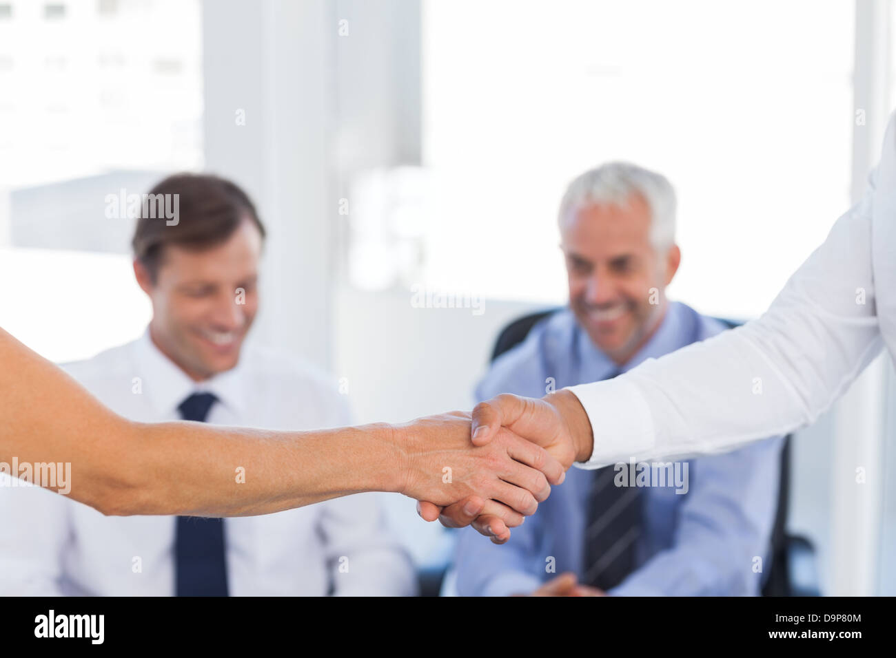 Close up of a handshake Stock Photo - Alamy