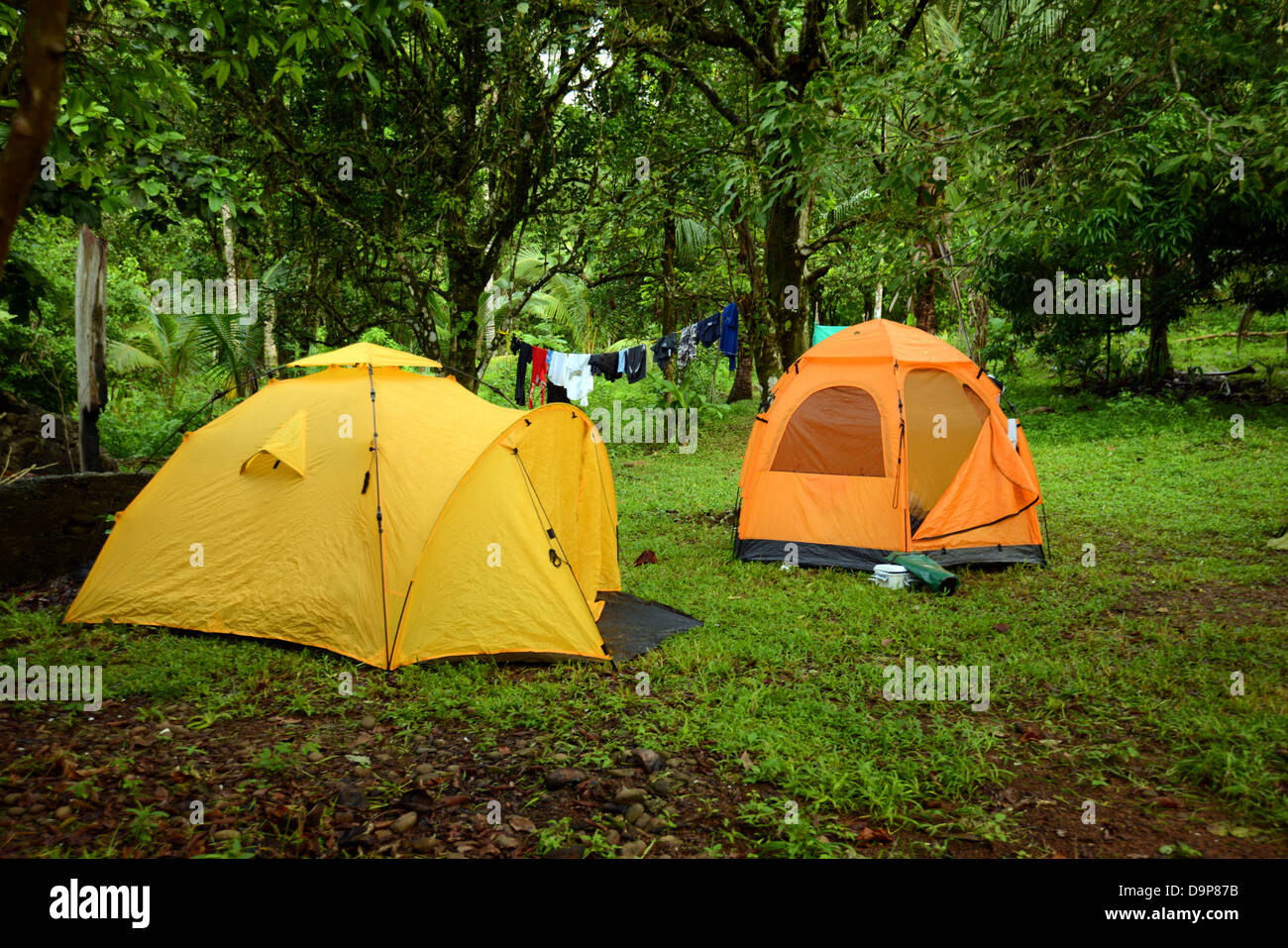 two tents on campground with laundry hanging up to dry on line Stock ...