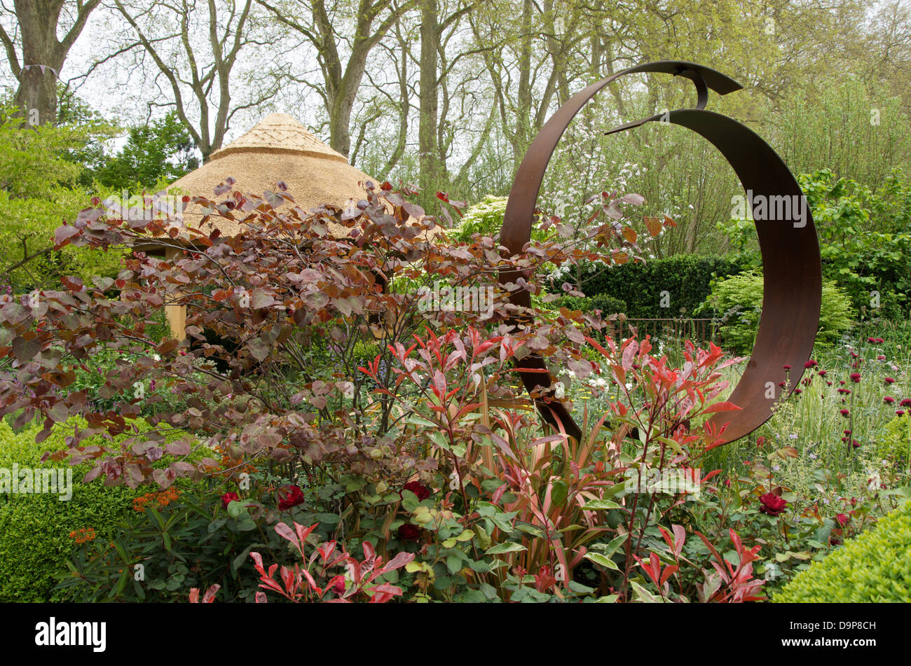 The corton steel sculpture in the M&G Centenary Garden 'Windows through ...