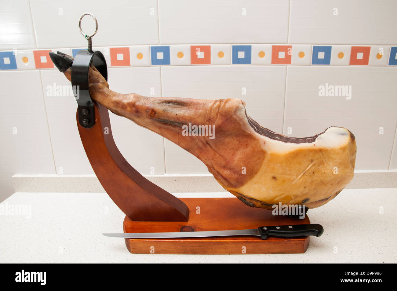 commissioning jamon leg prepared for cutting wood Stock Photo - Alamy