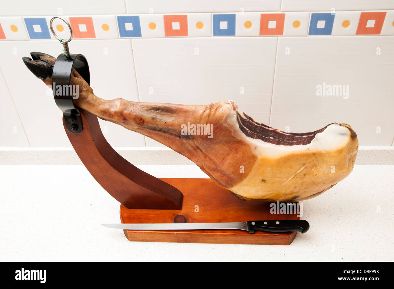 commissioning jamon leg prepared for cutting wood Stock Photo - Alamy