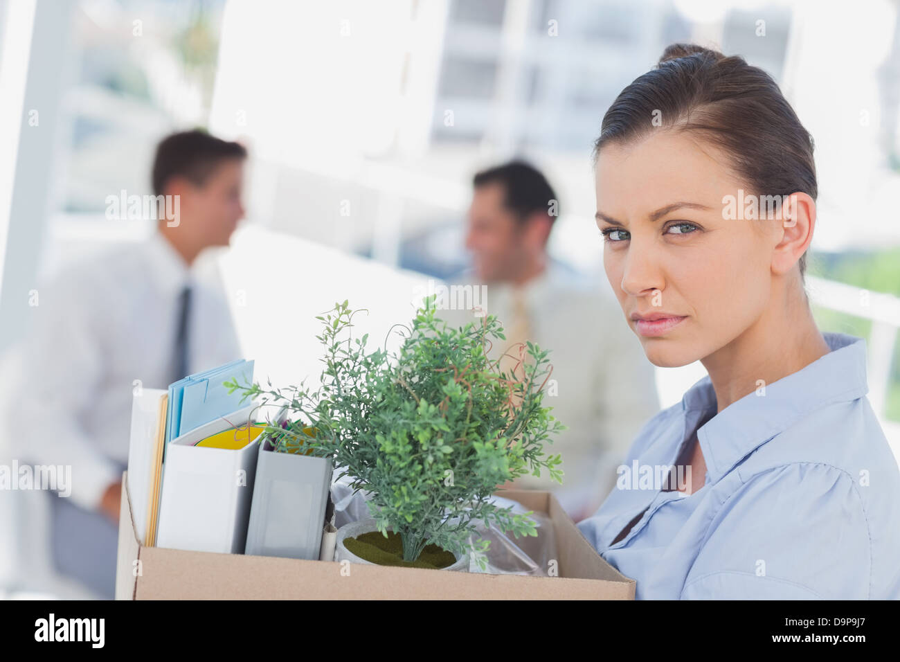 Woman leaving office desk hi-res stock photography and images - Alamy