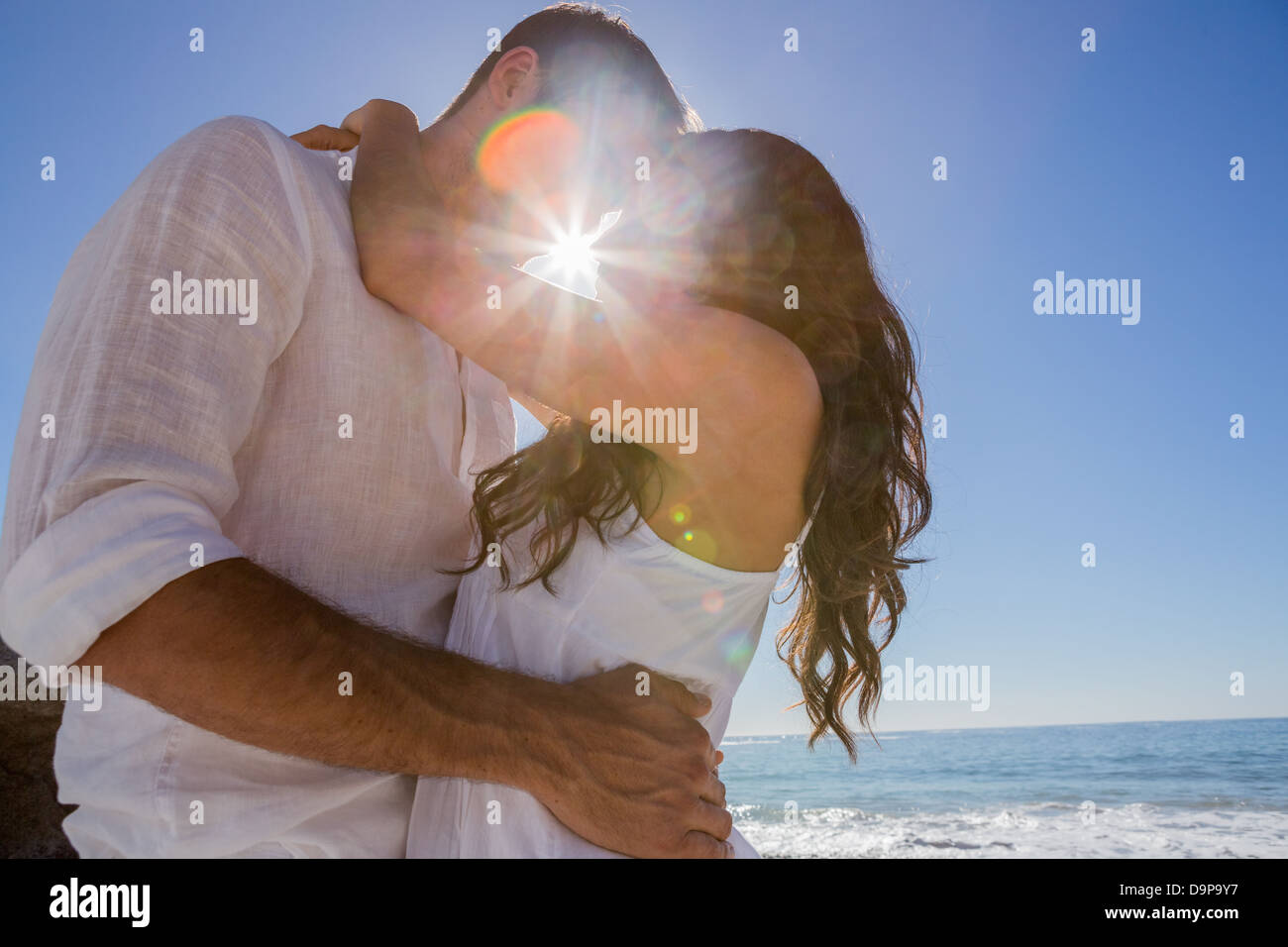 Cuddling by ocean hi-res stock photography and images - Alamy