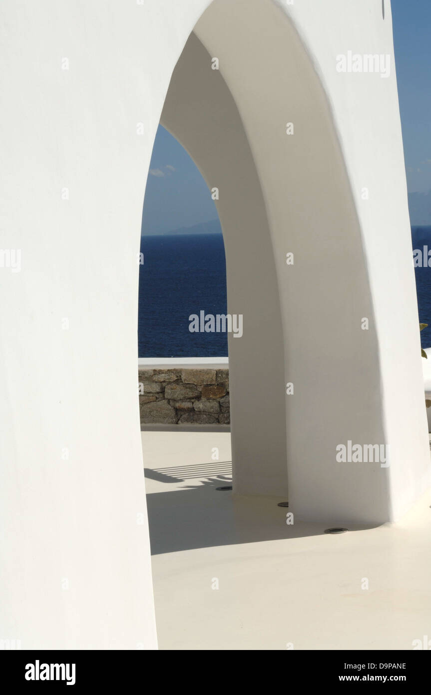 Ocean behind arch Stock Photo - Alamy