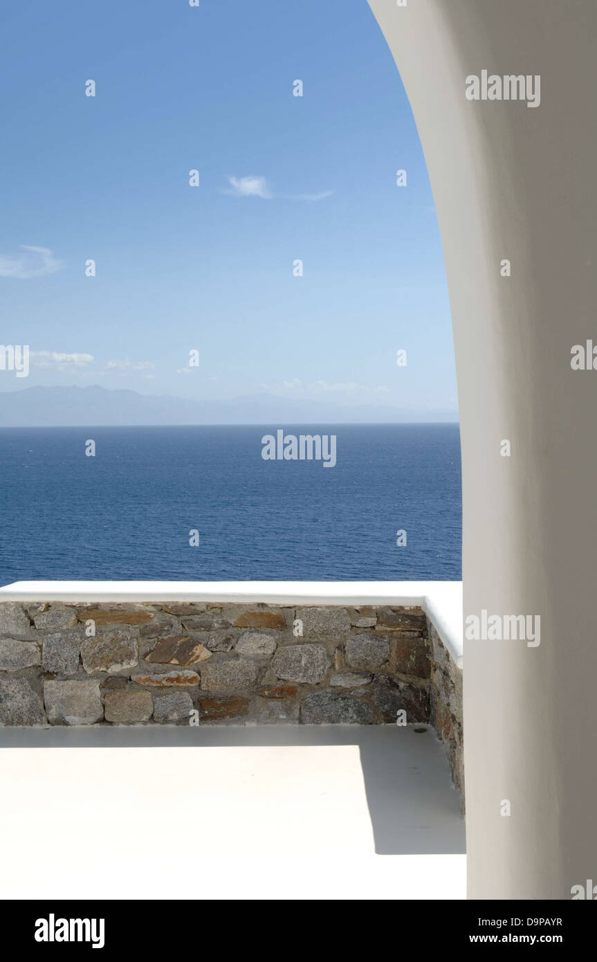 Ocean behind arch Stock Photo - Alamy