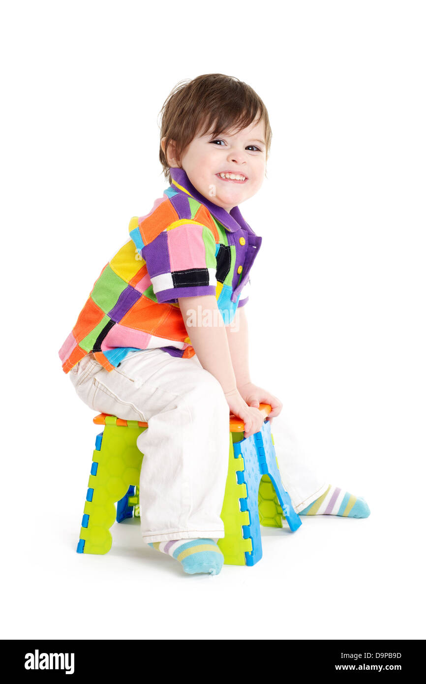 Sitting smiling boy on Cut Out Stock Images & Pictures - Alamy