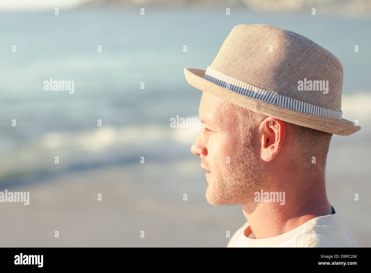 Handsome man on the beach Stock Photo - Alamy