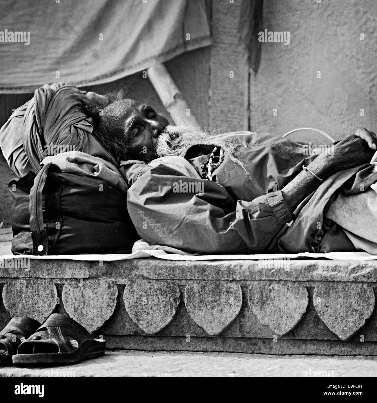 Elder shadu sleeping on a ghat, Varanasi, Benares, Uttar Pradesh, India ...