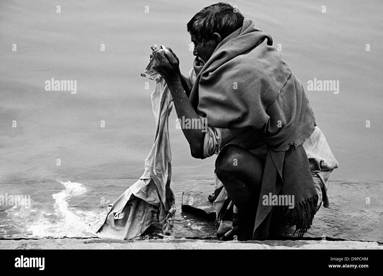 Indian man washing clothes hi-res stock photography and images - Alamy