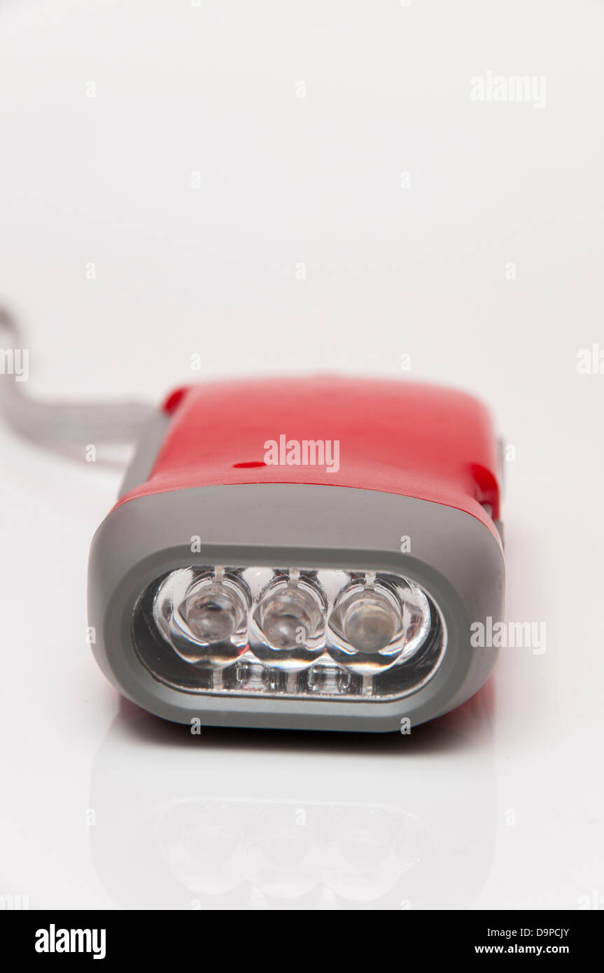 dynamo flashlight red color that can be charged via a pulley spinning ...