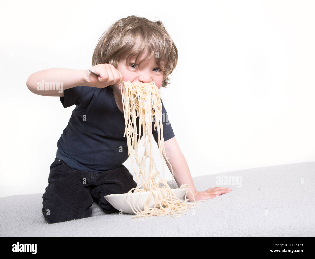 Small boy eating lunch hi-res stock photography and images - Alamy