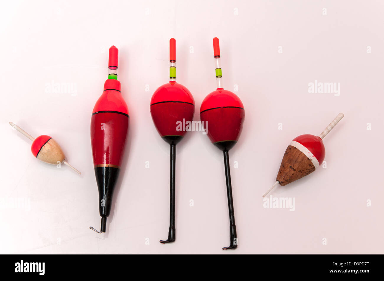 floats for fishing red color for a closer look Stock Photo - Alamy