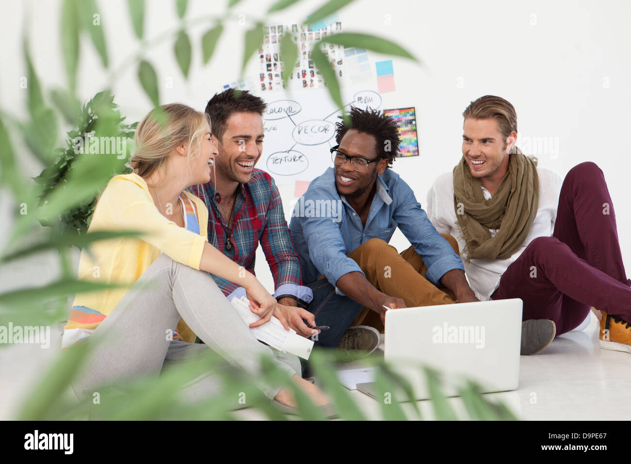 Dynamic team of creative designers working together Stock Photo - Alamy