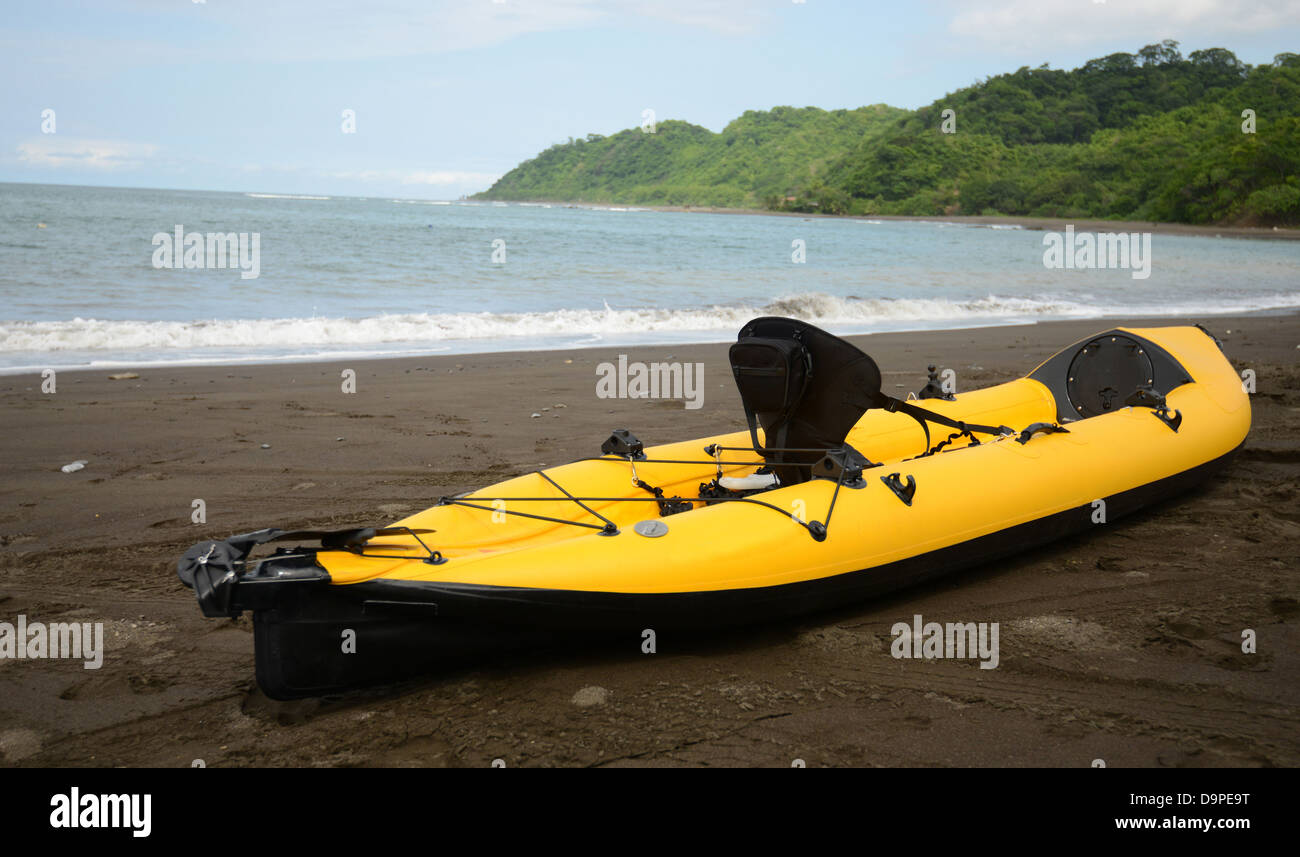 yellow kayak on beach in central america Stock Photo - Alamy