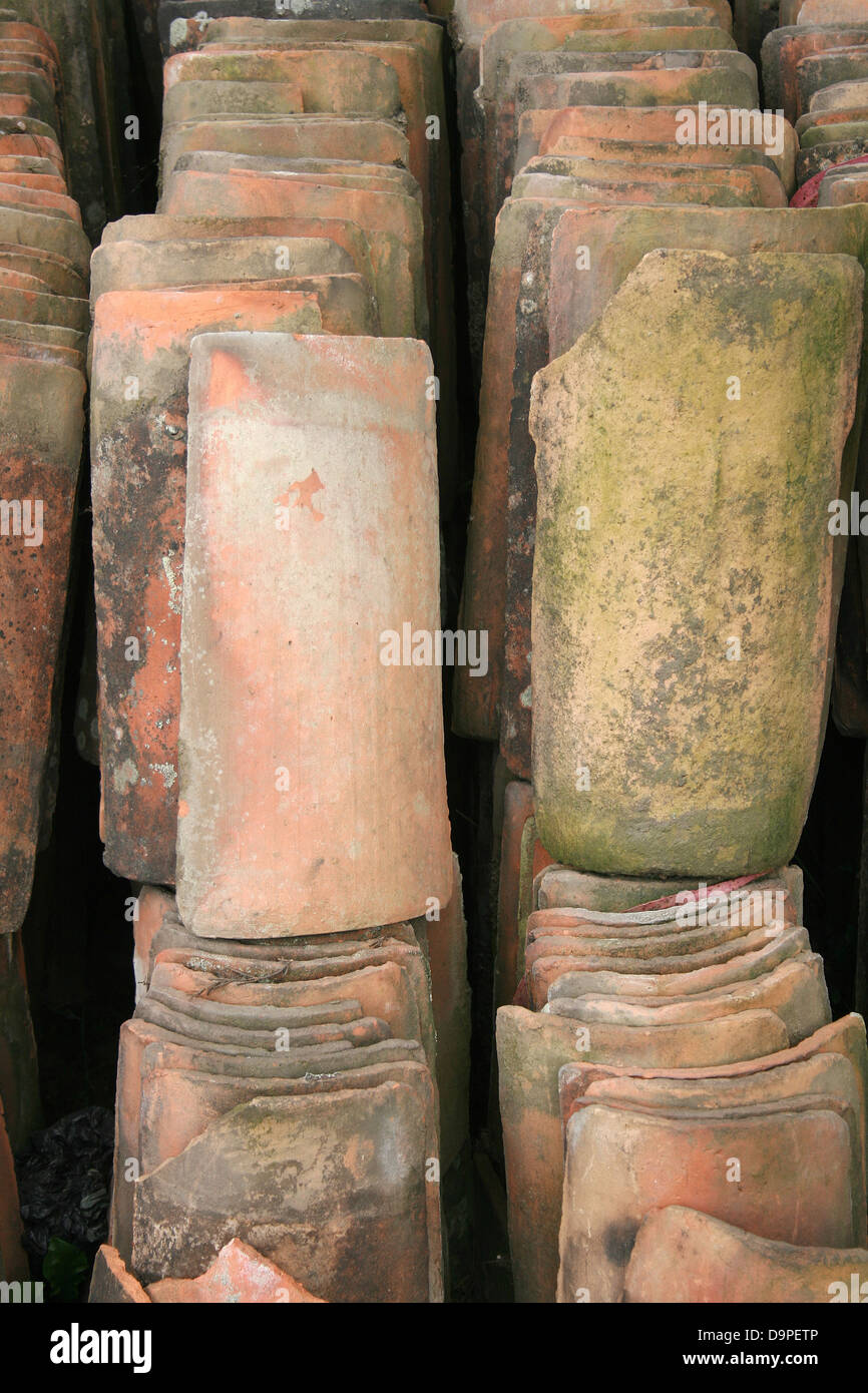 Stacked Terracotta shingles at a construction site in Cotacachi ...