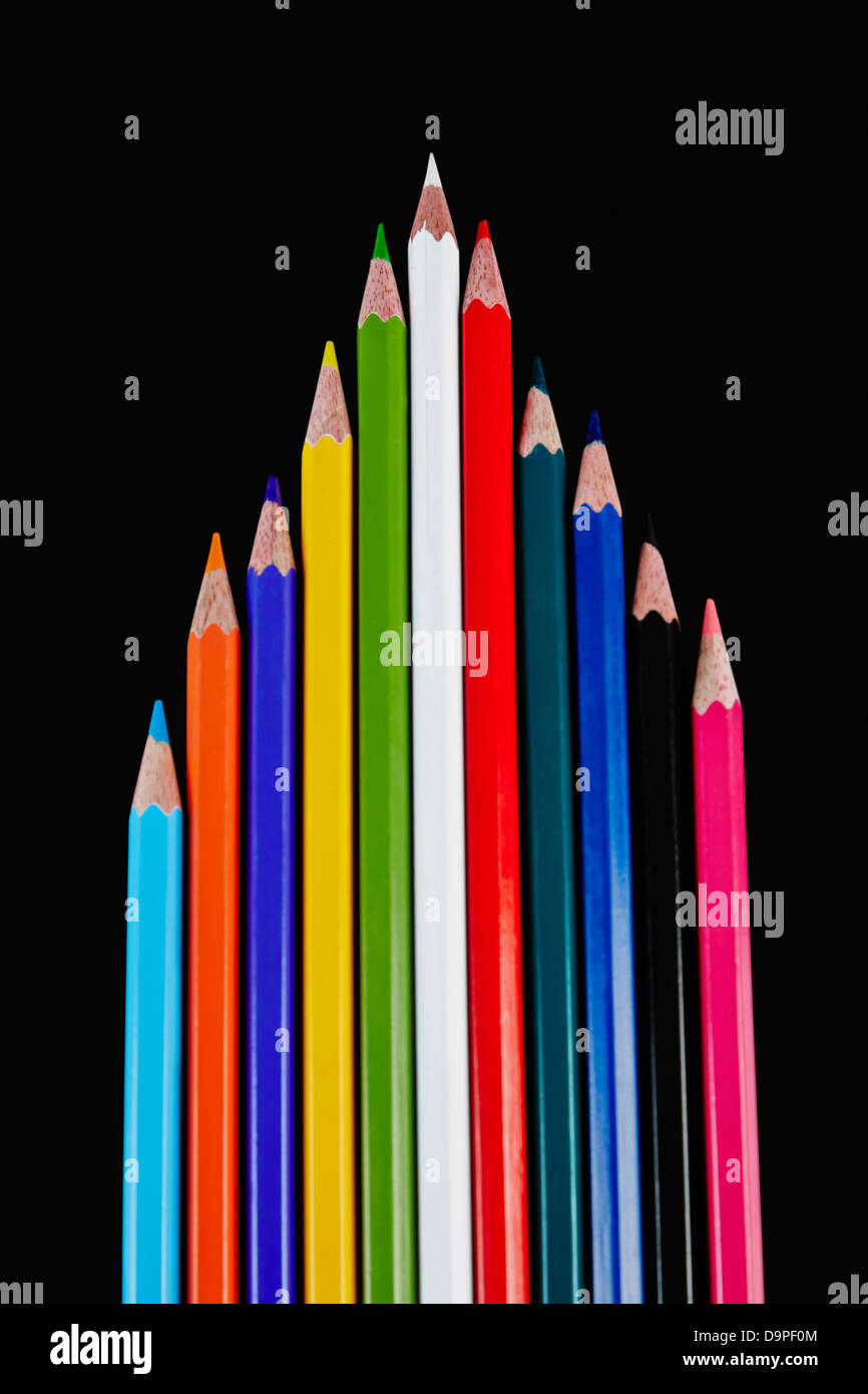 Colored pencils in a row Stock Photo - Alamy