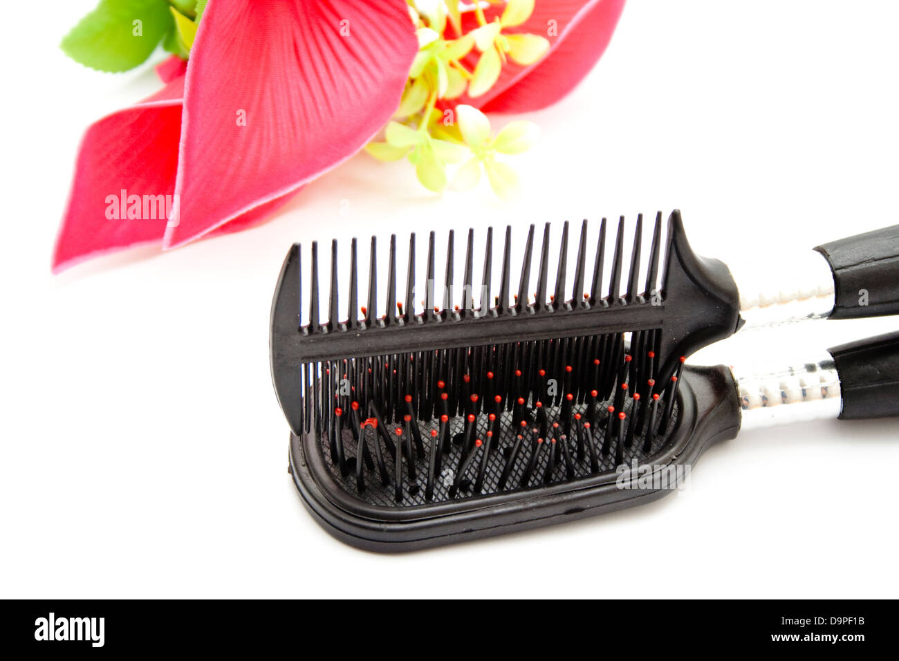 Plastic hairbrush on white background Stock Photo - Alamy