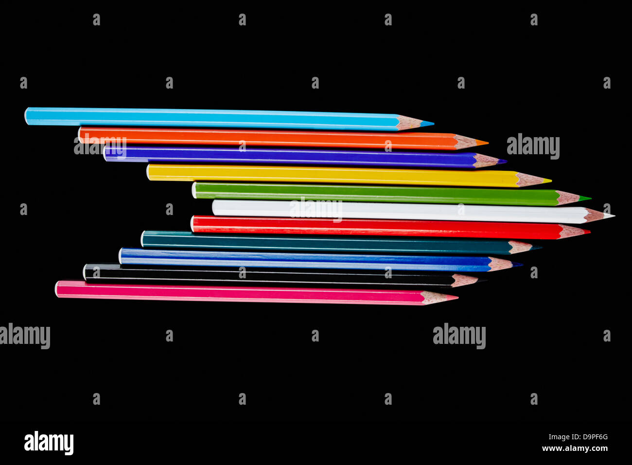 Colored pencils in a row Stock Photo - Alamy