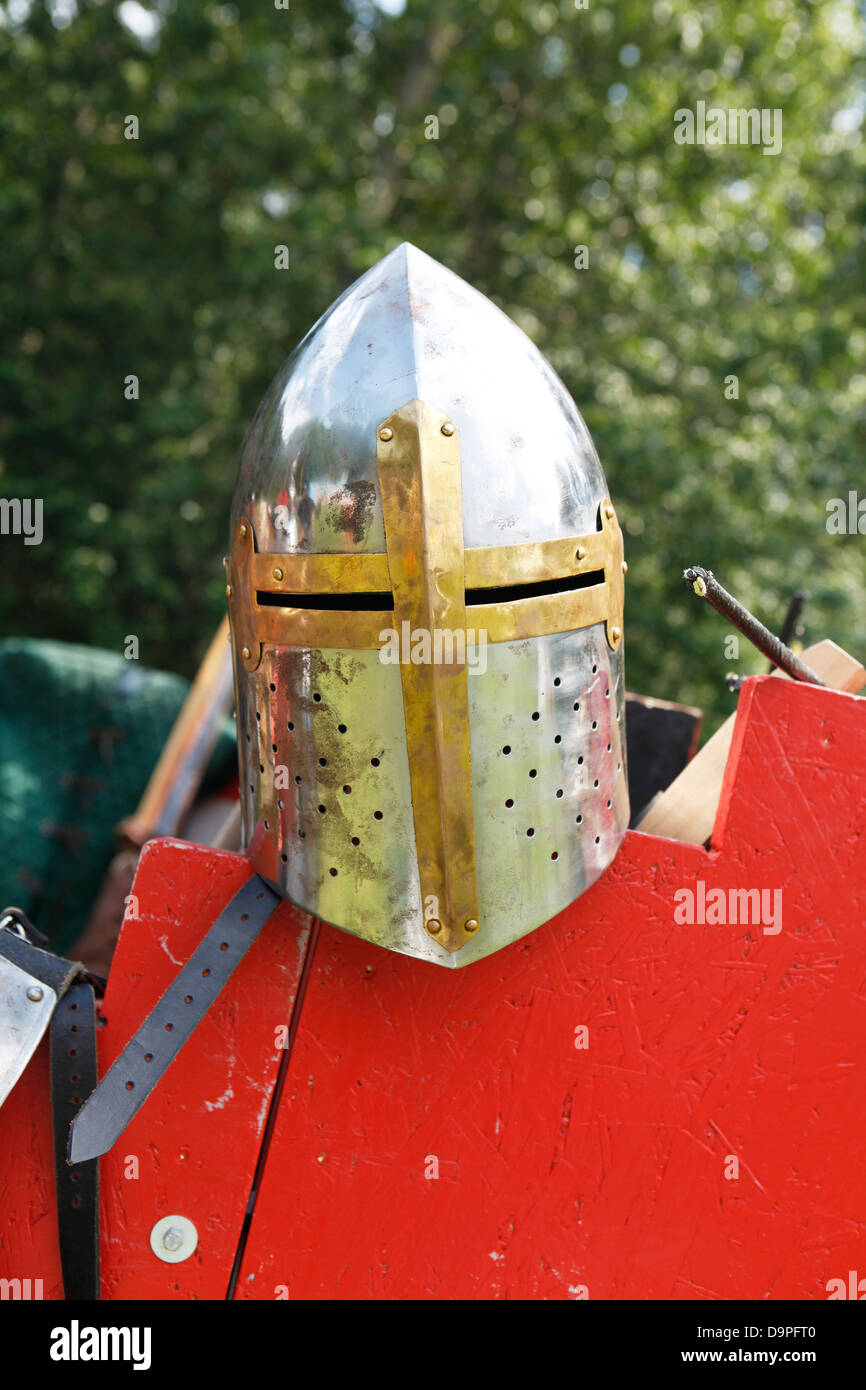 Medieval knights helmet with visor outdoors with accessories in the ...