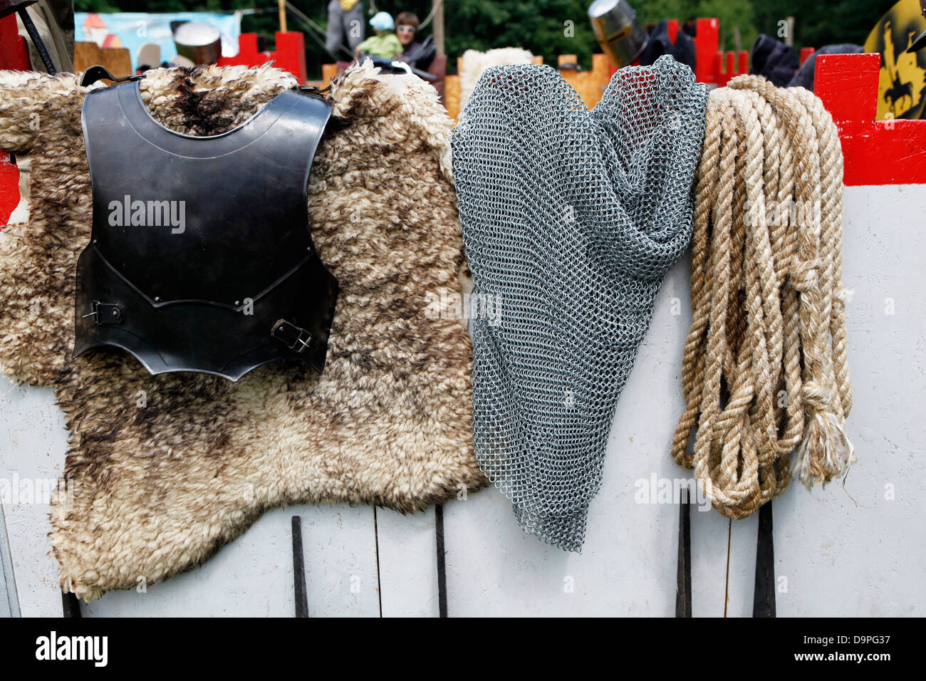 Medieval knights uniform with rope and fur hanging ready to be worn ...
