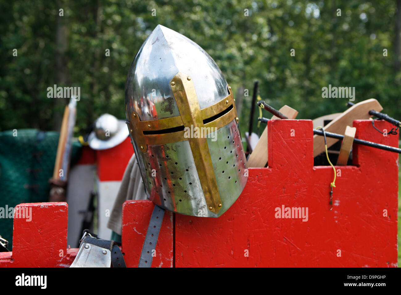 Medieval knights helmet with visor outdoors with accessories in the ...