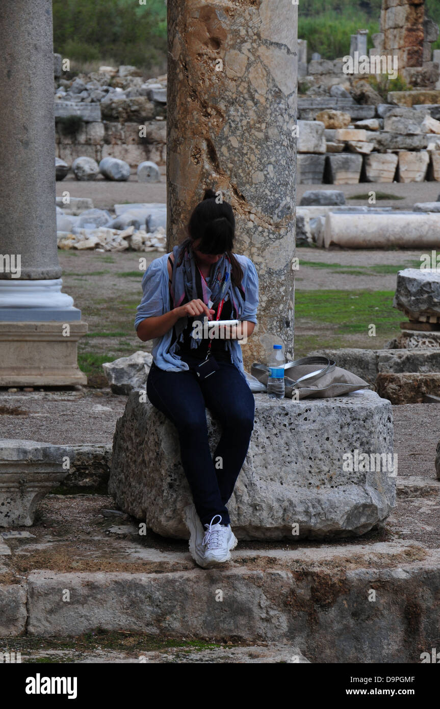 Tour guide on phone Stock Photo - Alamy