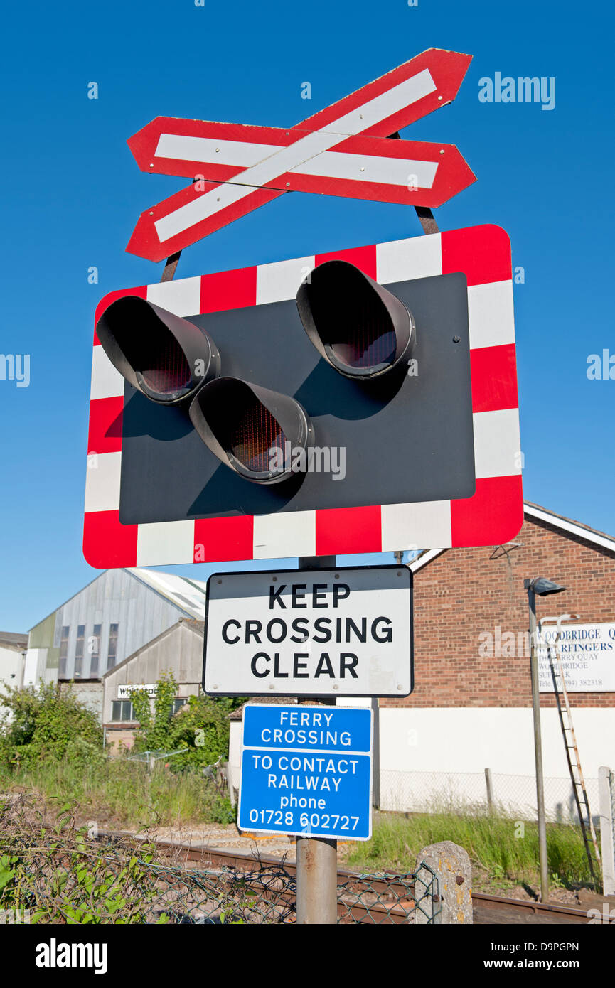 Warning lights protecting an un-gated railway level crossing Stock ...