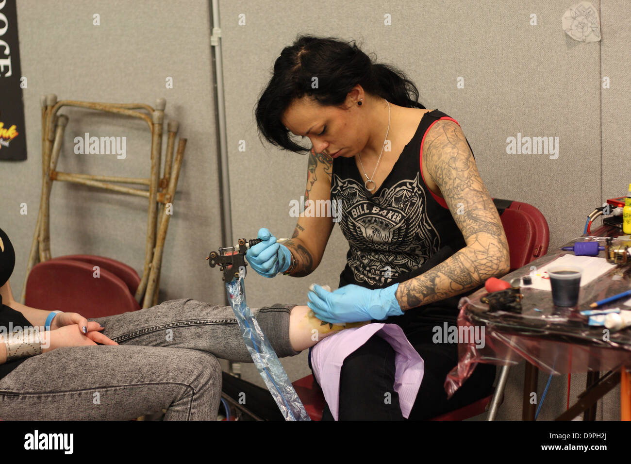 Female Tattoo Artist At Work