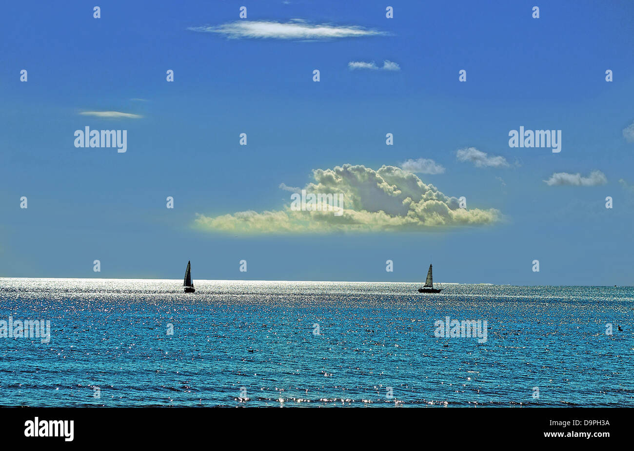 A serene and peaceful scene of a calm blue sky with clouds, capturing ...