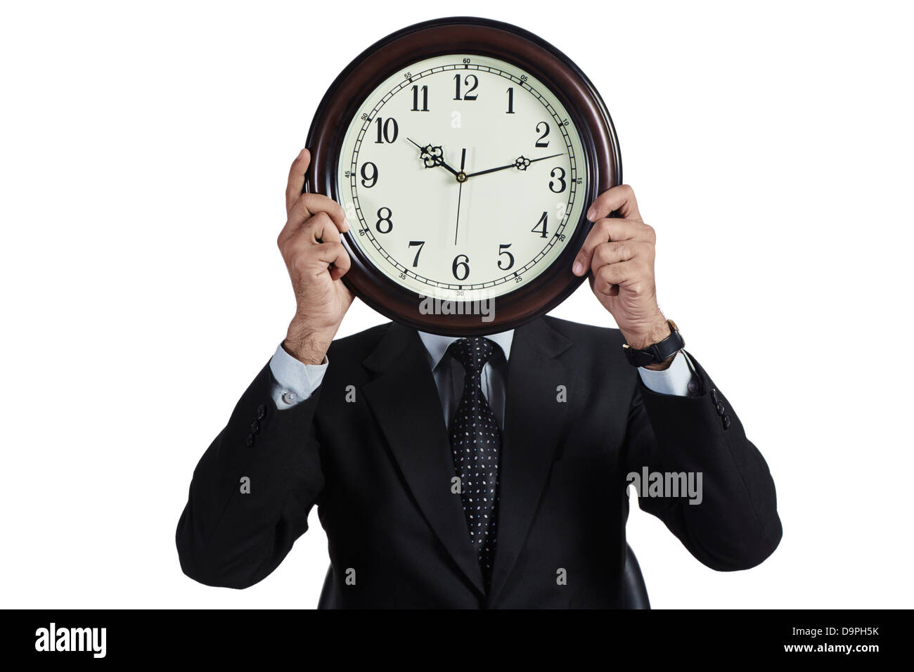 Hands holding clock hi-res stock photography and images - Alamy