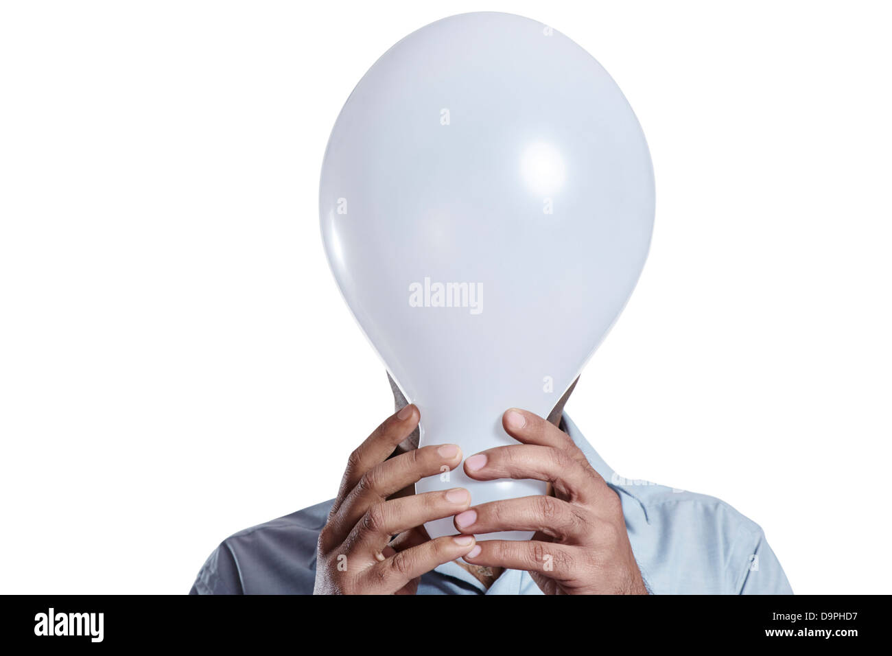 Man holding object in front of face hi-res stock photography and images ...