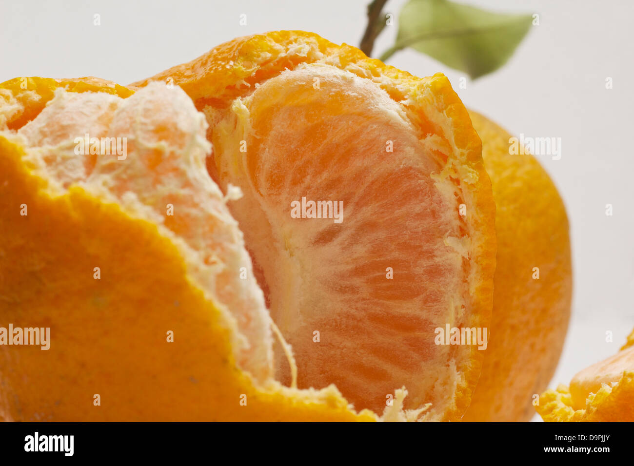 Sliced tangerine hi-res stock photography and images - Alamy