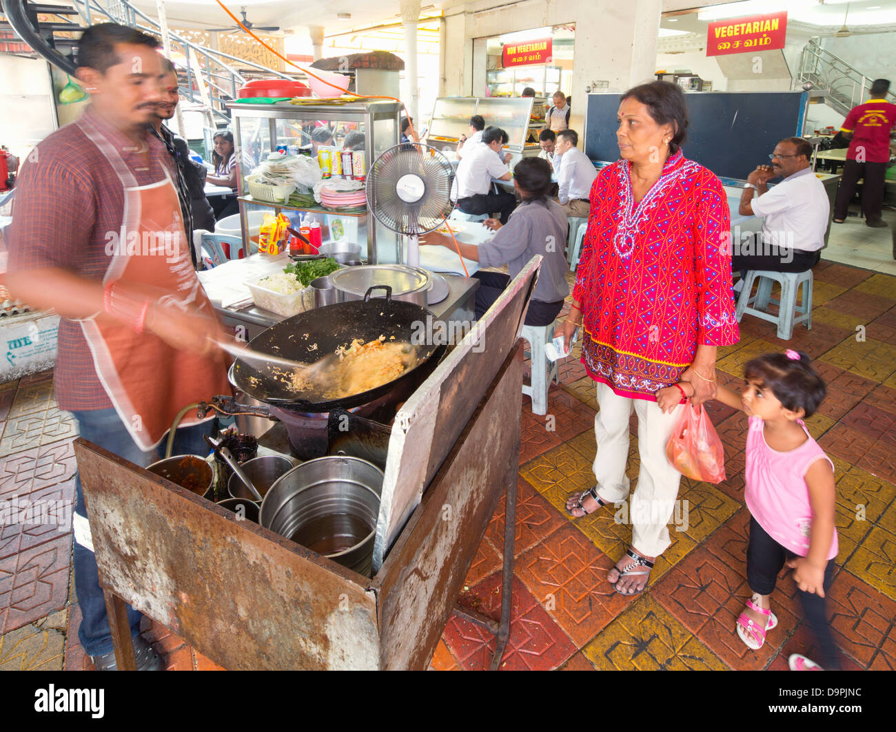 Food being prepared in restaurant, Brickfields, Little India, Kuala ...